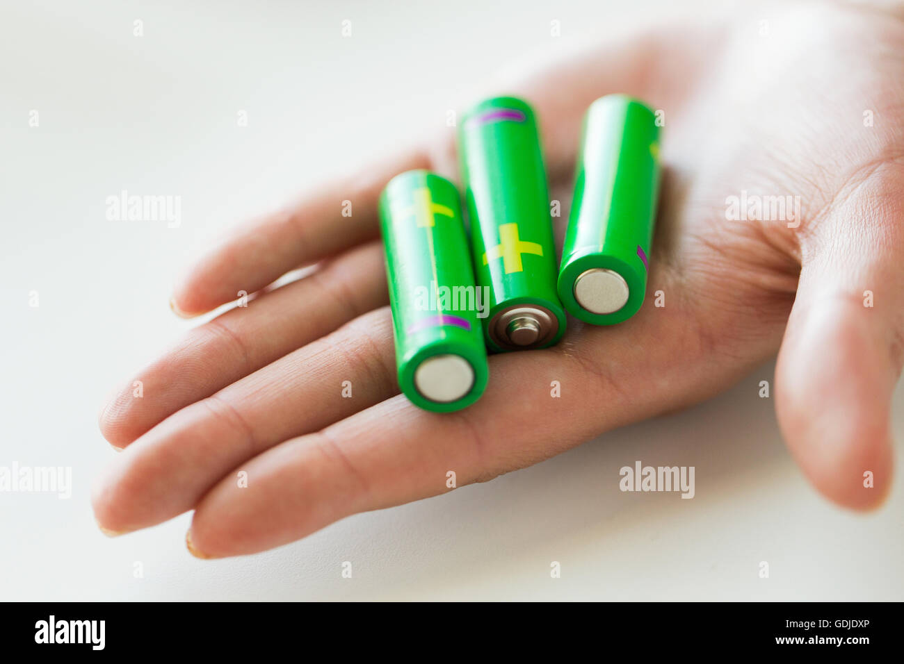 Hand with batteries hi-res stock photography and images - Alamy