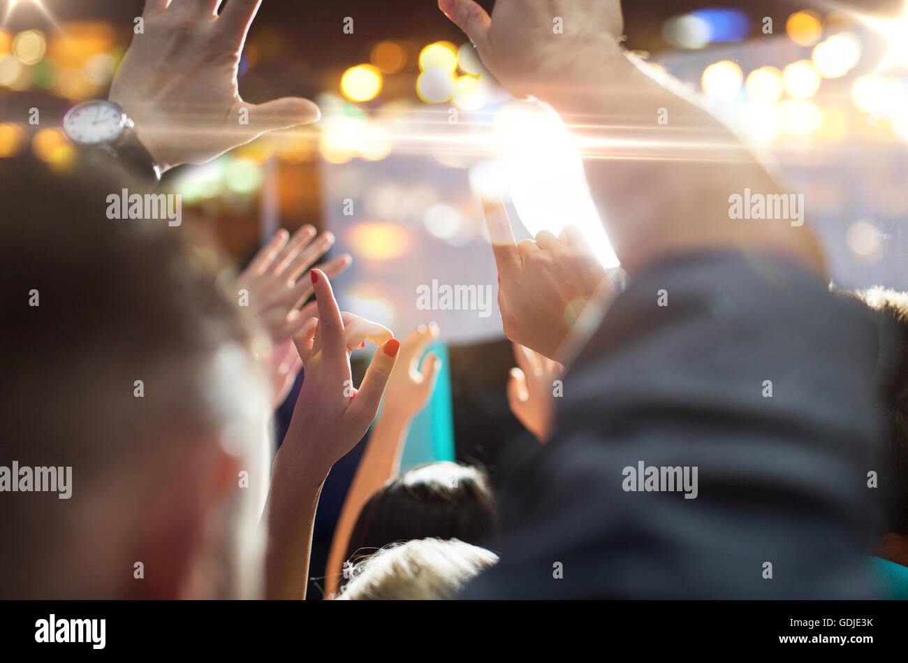 close up of happy people at concert in night club Stock Photo - Alamy