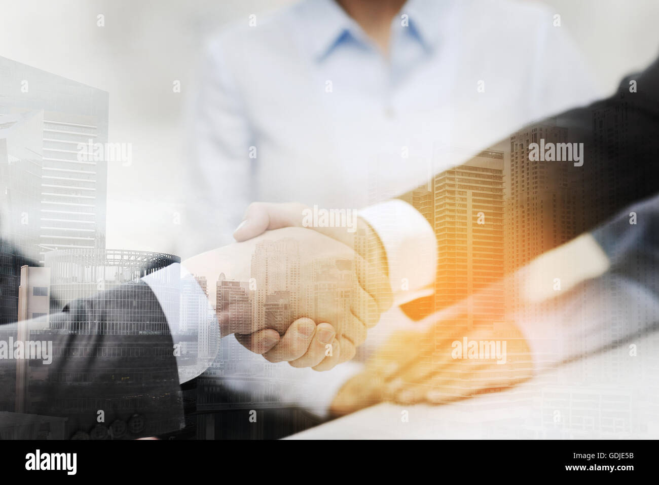 Woman shaking hands men hi-res stock photography and images - Alamy
