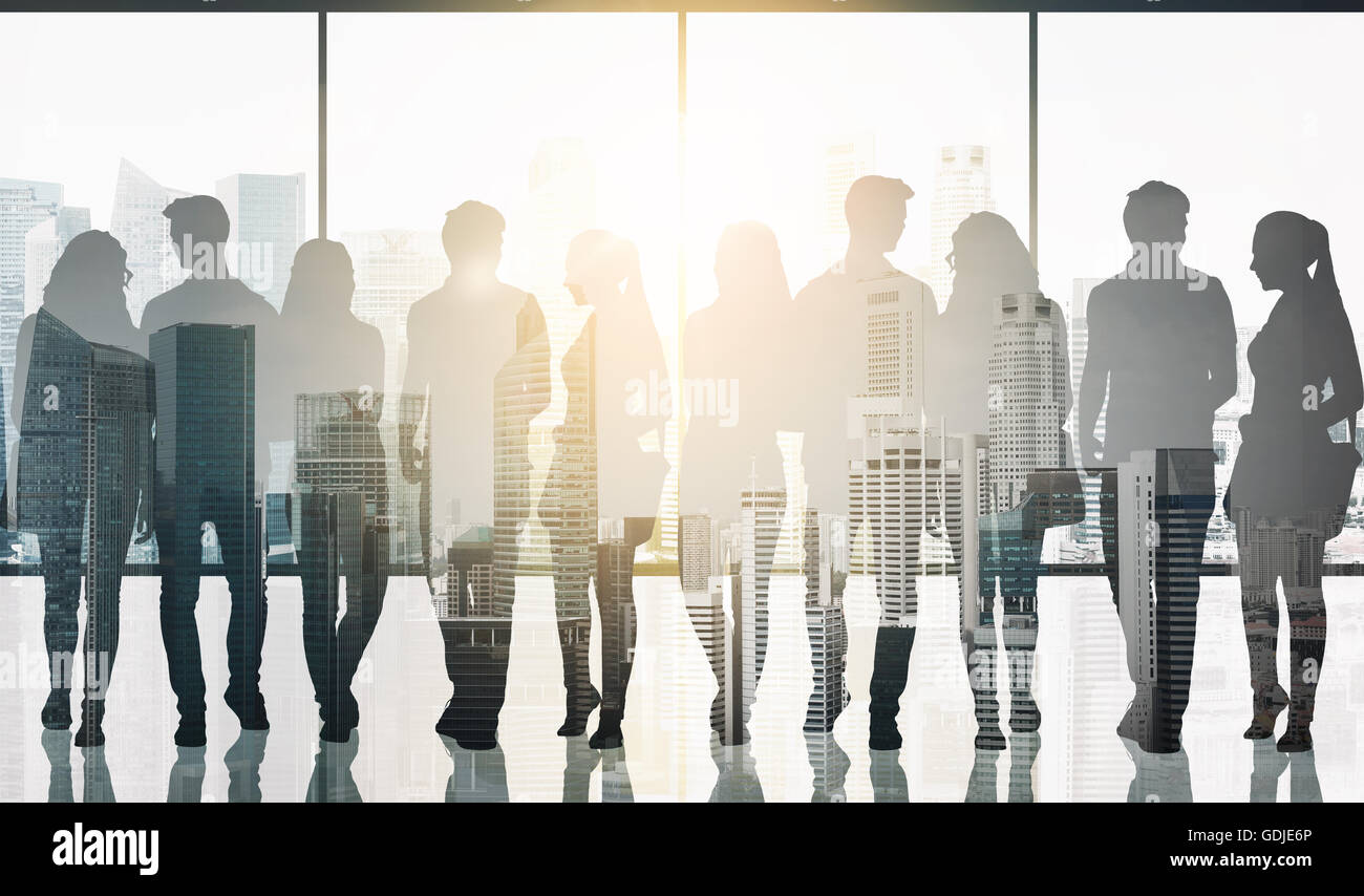 people silhouettes over window and city background Stock Photo - Alamy