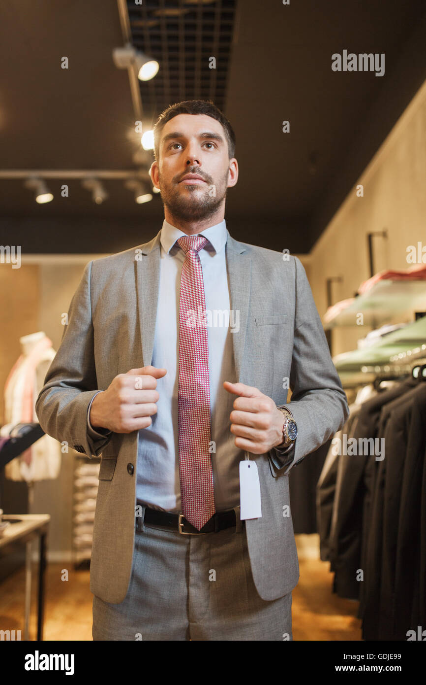 Man trying his suit hi-res stock photography and images - Alamy