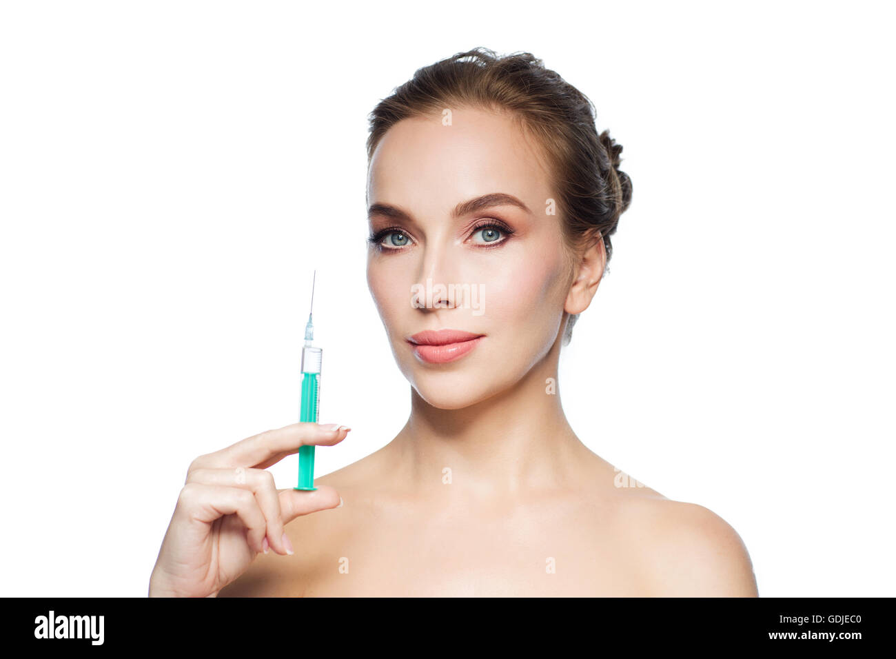 beautiful woman holding syringe with injection Stock Photo - Alamy