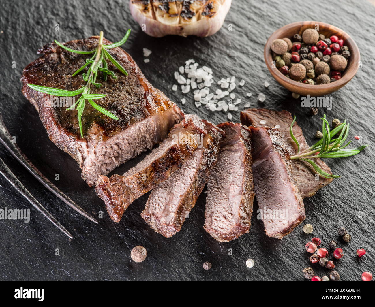 Rib eye steak on wooden hi-res stock photography and images - Alamy