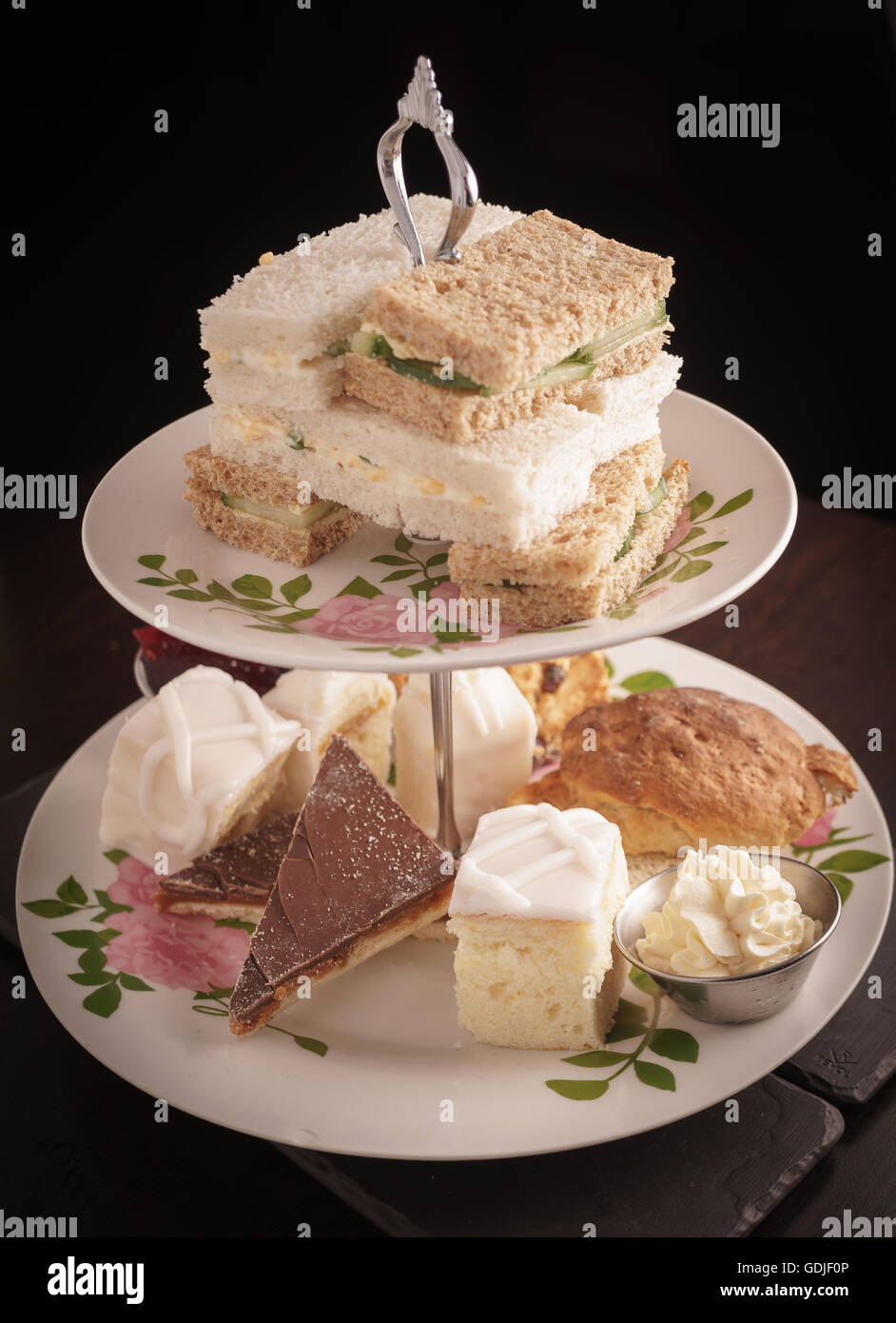 Traditional tea for two, served on tiered plates Stock Photo - Alamy