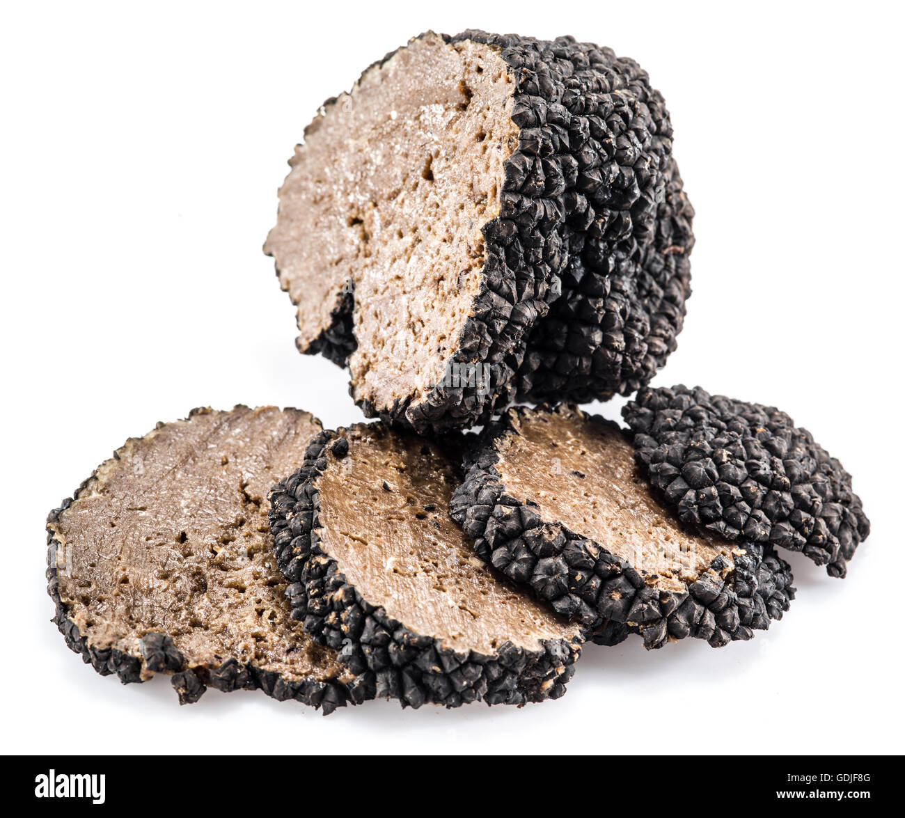 Black truffles isolated on a white background Stock Photo - Alamy
