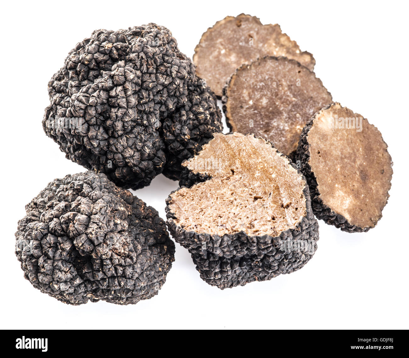 Black truffles isolated on a white background Stock Photo - Alamy