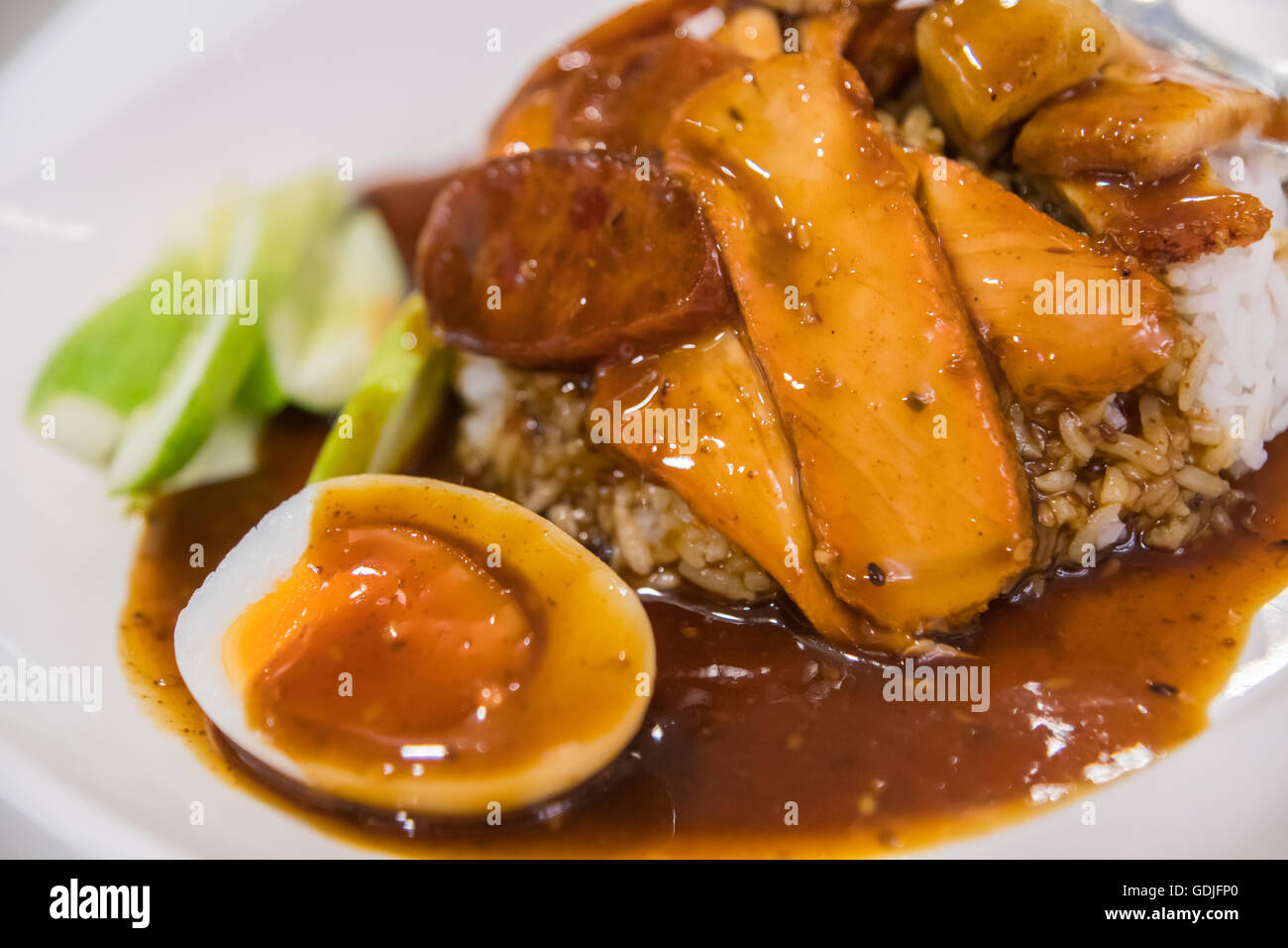 thai food is name rice red pork sauce Stock Photo - Alamy