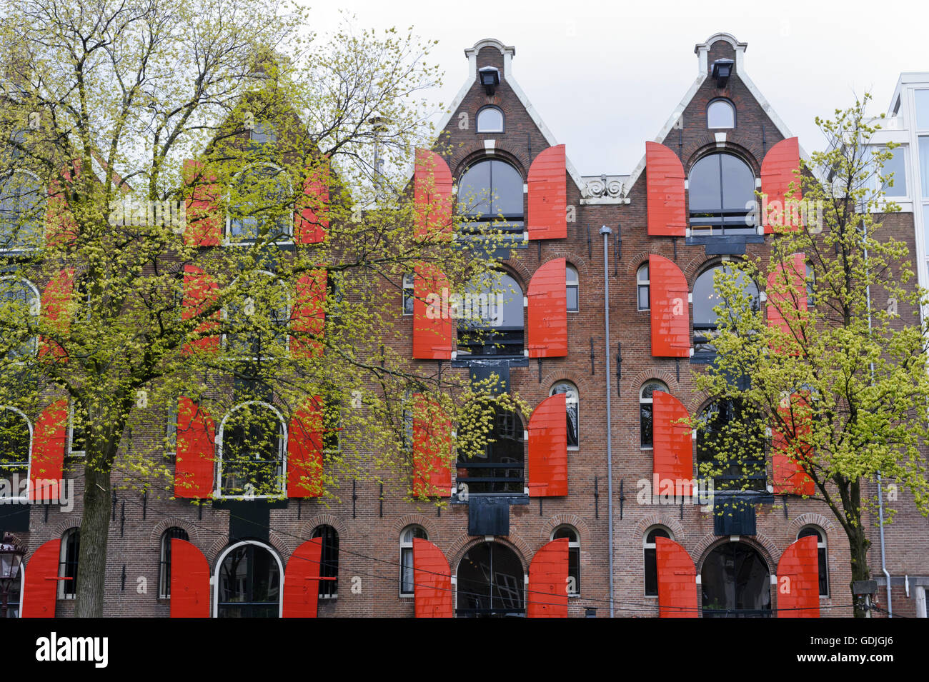 A row of traditional buildings in Amsterdam, Holland, Netherlands Stock ...