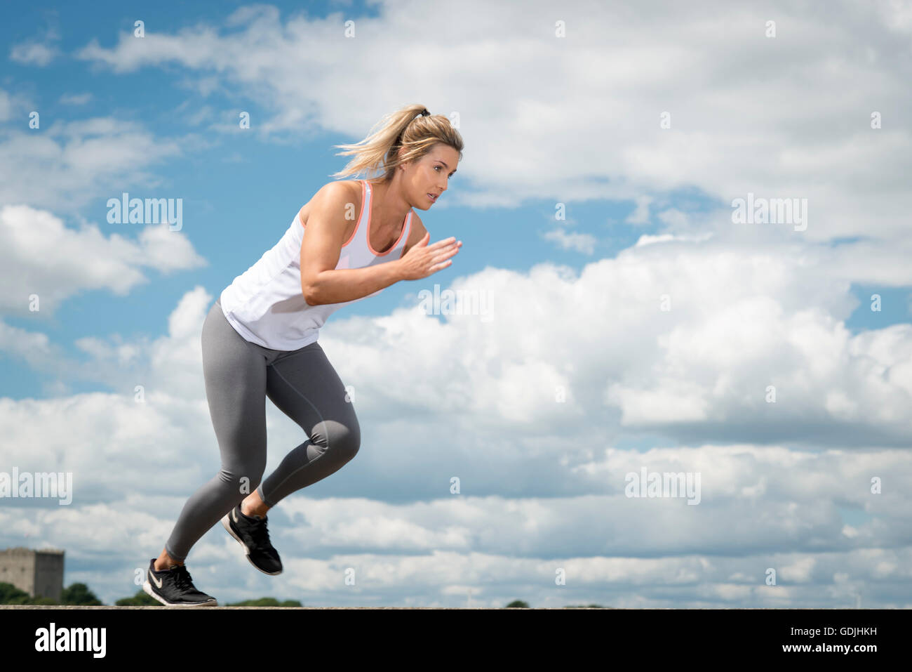 fit woman running Stock Photo - Alamy