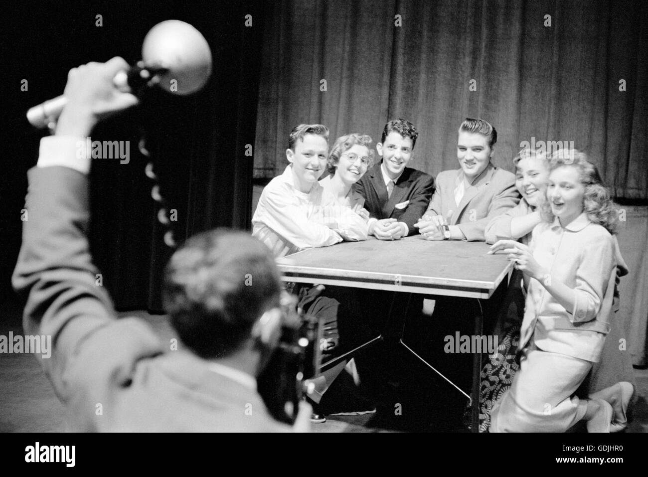 Elvis Presley being photographed with fans at the Fox Theater in ...