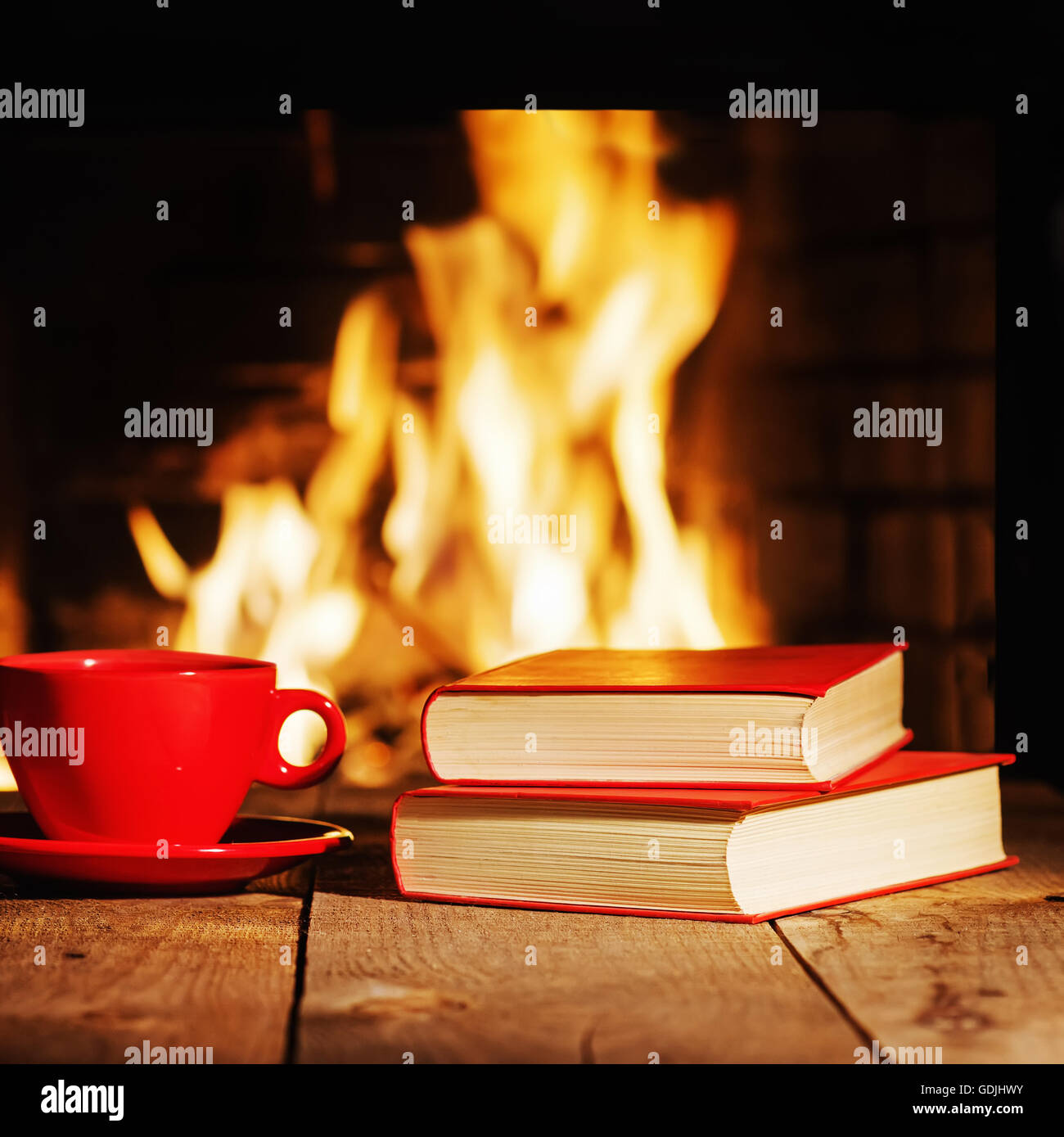 Books by fireplace hi-res stock photography and images - Alamy