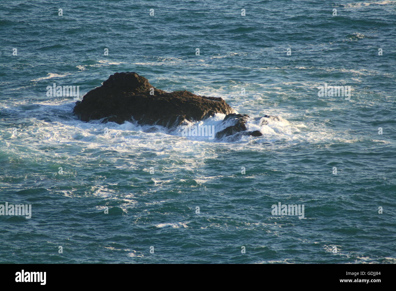 Rocks in Sea Ocean Stock Photo - Alamy