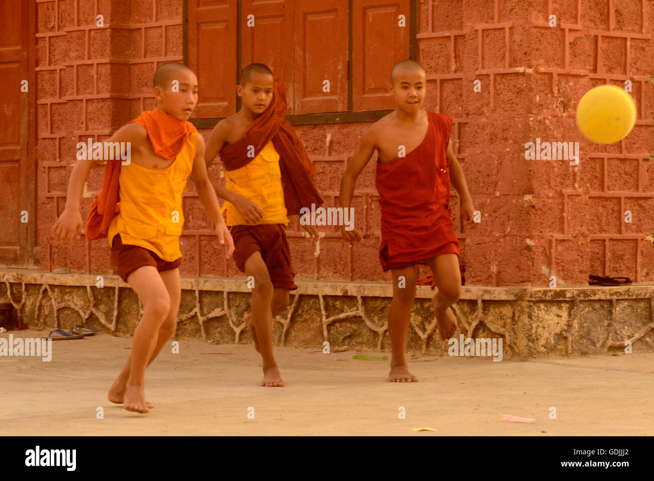 Young Monks Play Soccer in a Pagoda in the town of Nyaungshwe at the ...