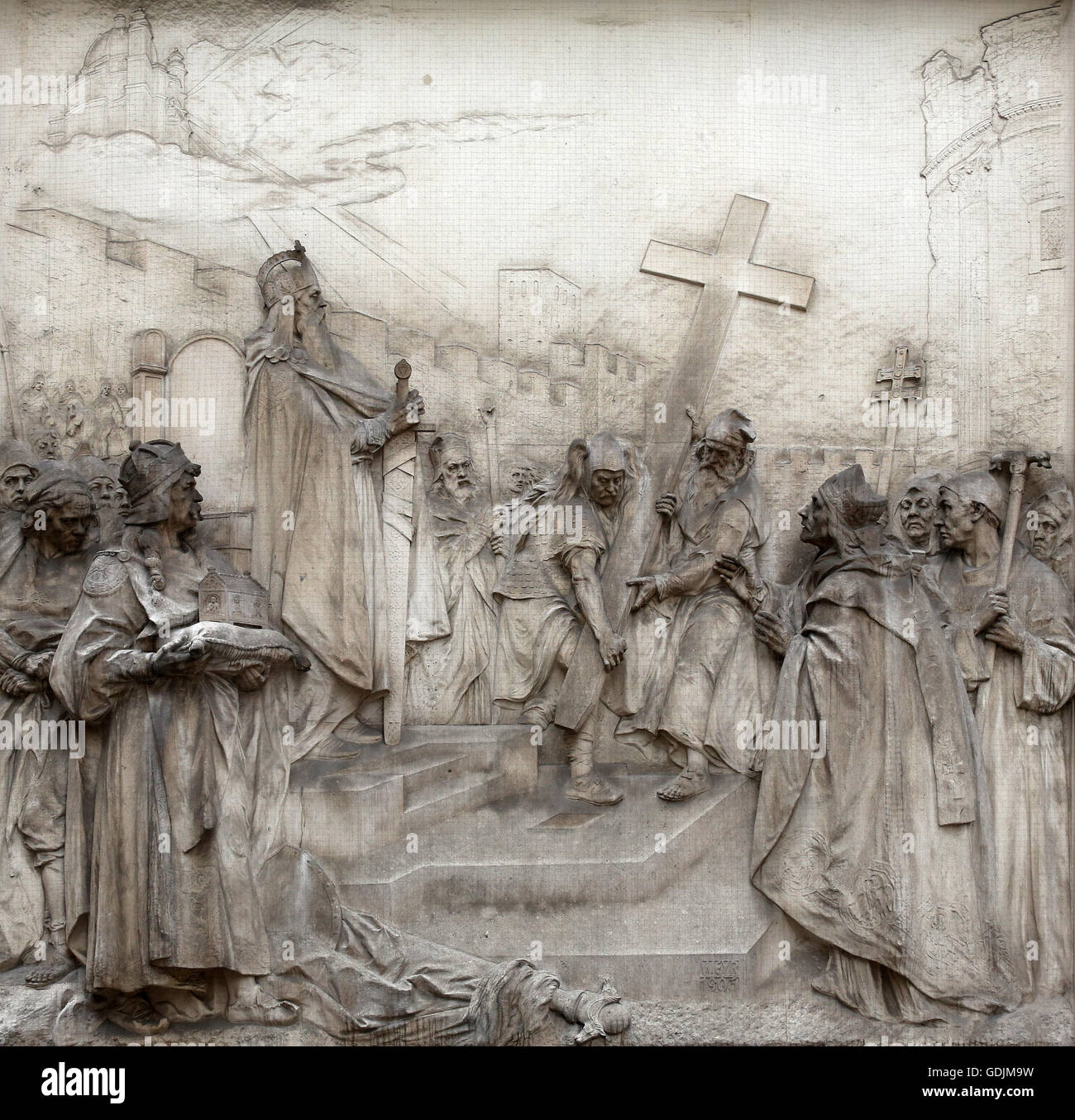 A relief plaque on the right side of the church tells of the legend of ...