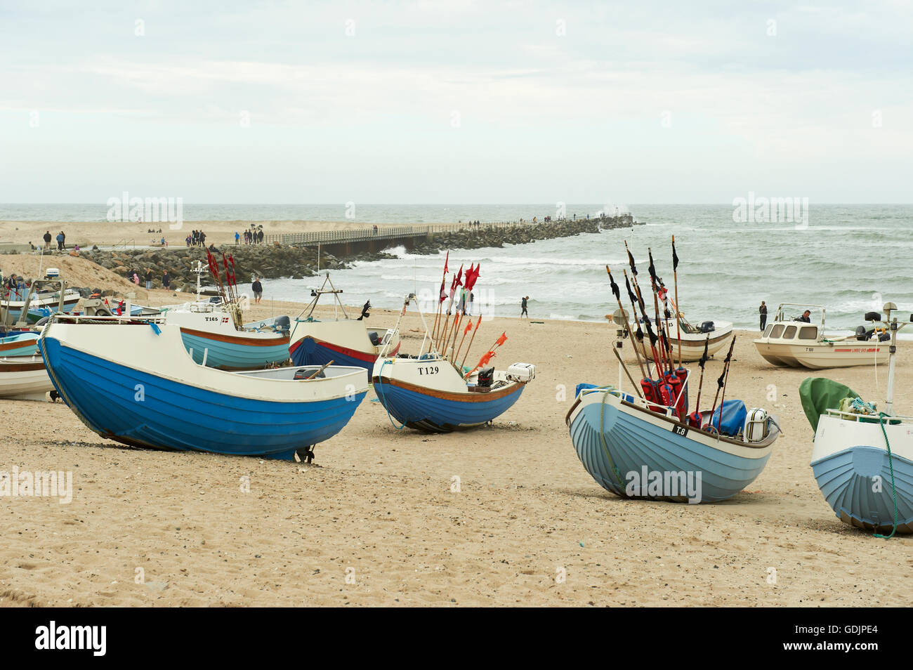 Fishing boats on beach Stock Photo - Alamy