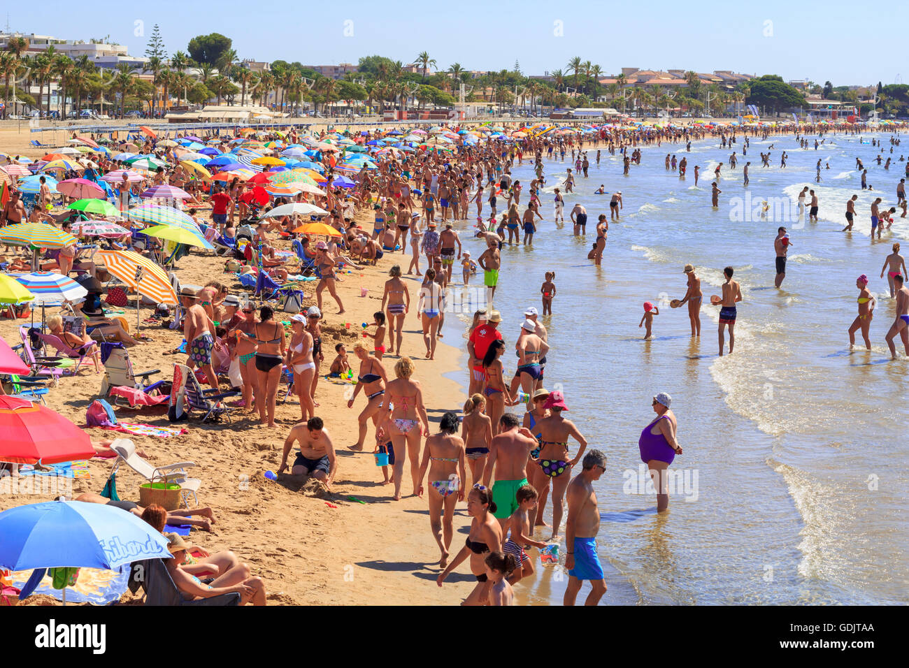 Woman sunbathing on beach in spain hi-res stock photography and images ...