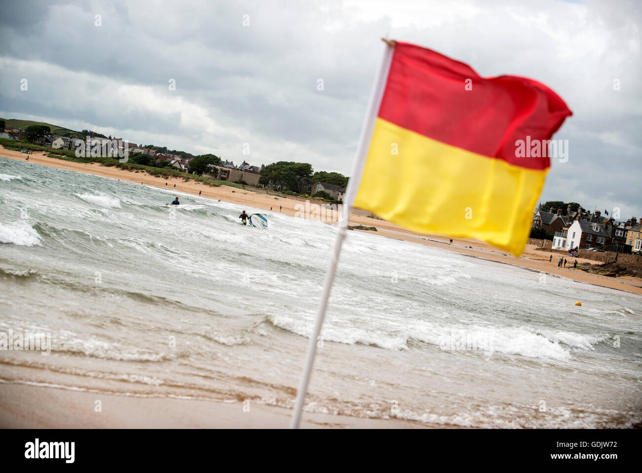 RNLI lifeguard Flag on Earlsferry beach in the Fife coastal village of ...
