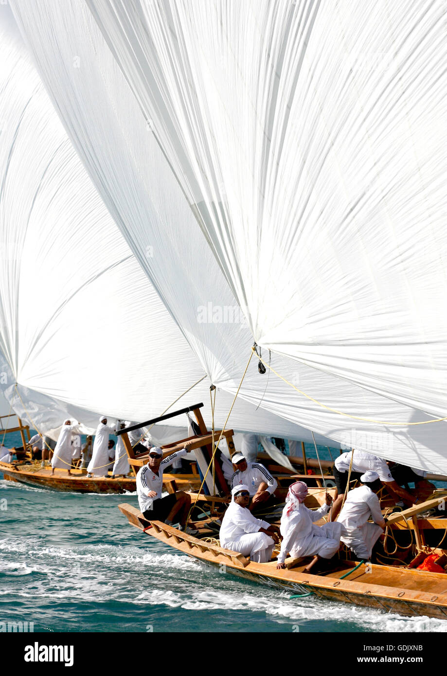 Sailors during a traditional dhow race in Dubai, United Arab Emirates ...