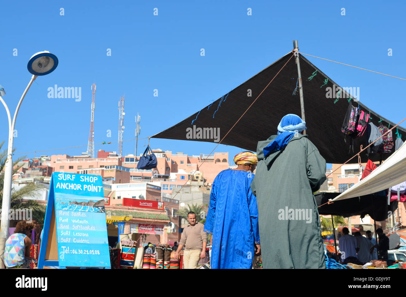 Two men wearing Moroccan traditional clothes in a local market in ...