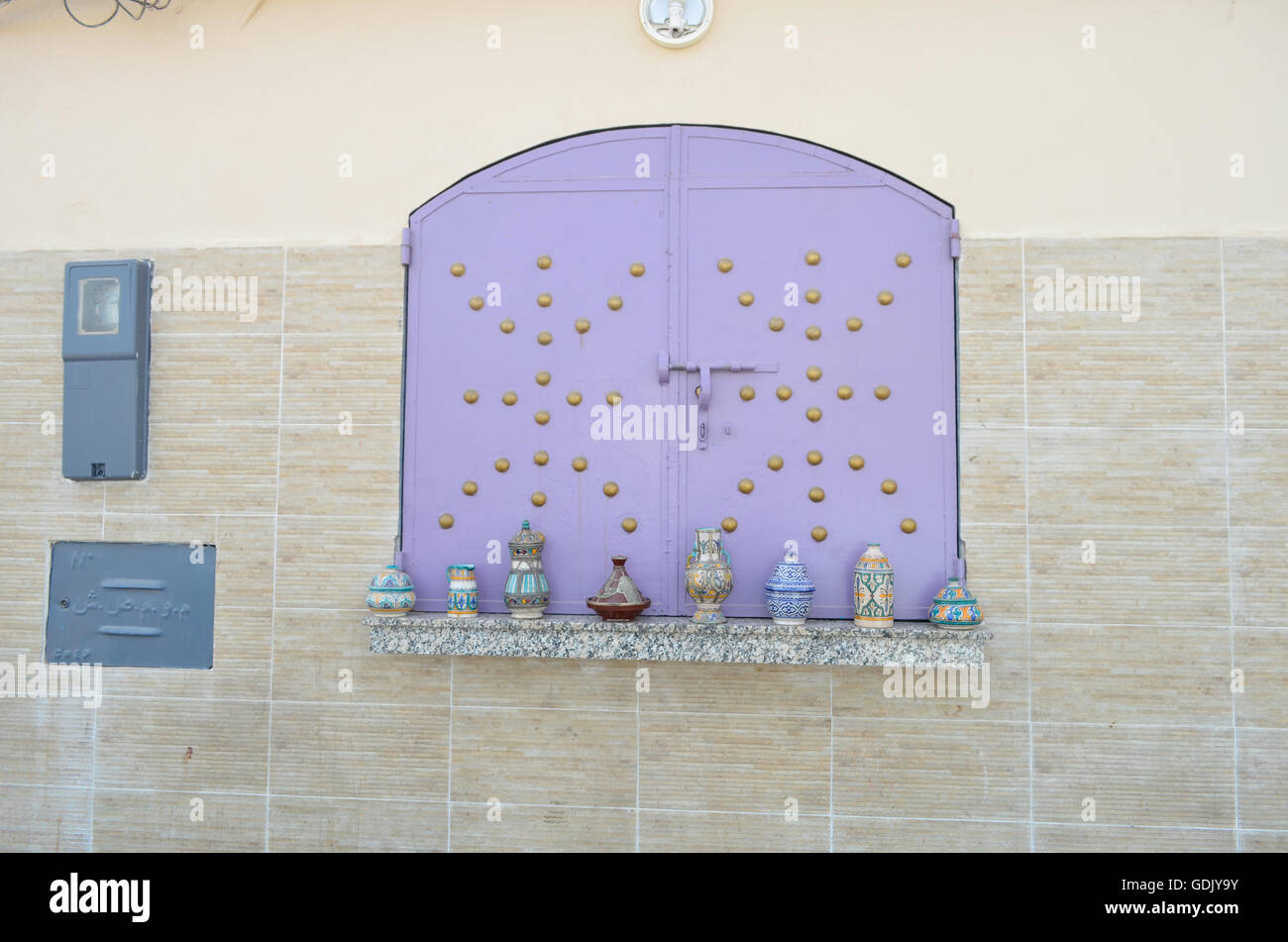 Local vendor displays his Goods on a traditional Moroccan window Stock ...
