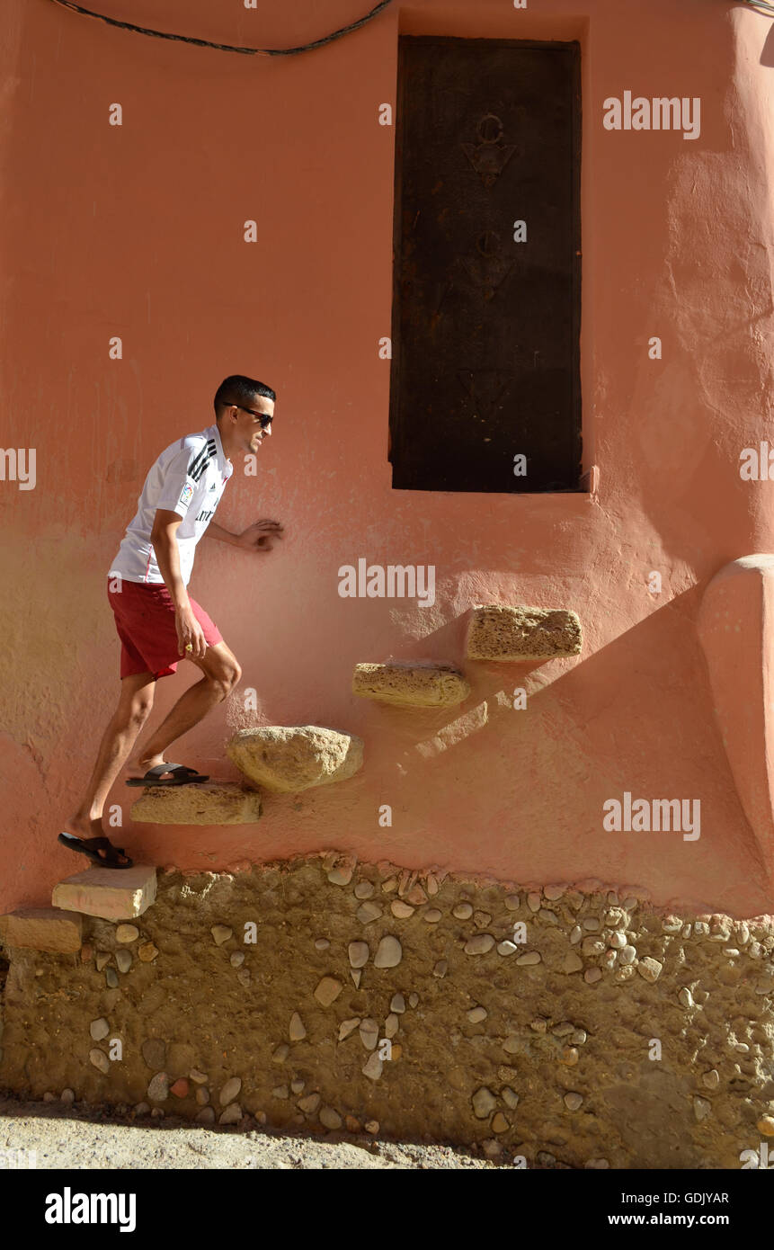 Man climbing stairs in house hi-res stock photography and images - Alamy