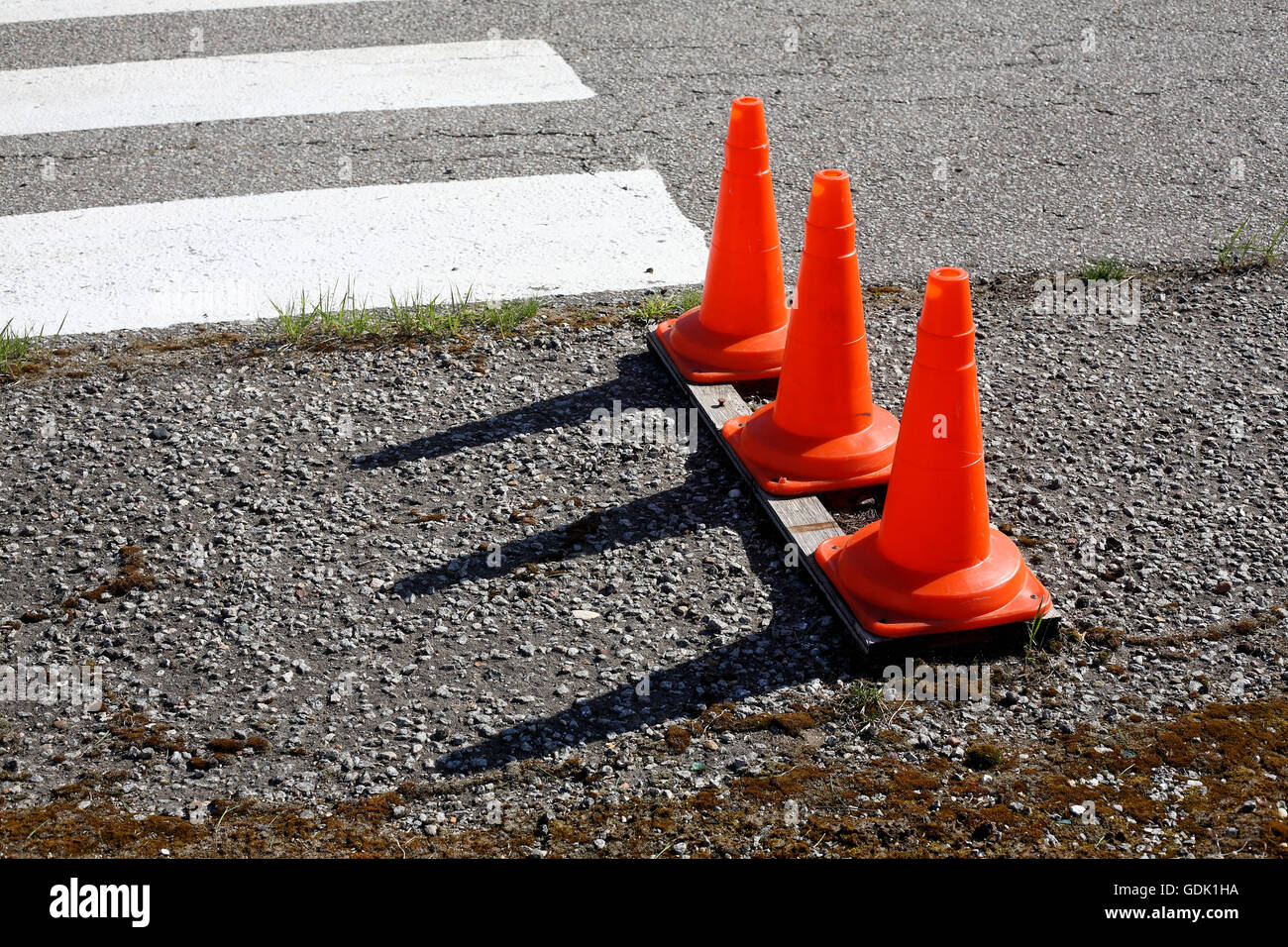 Aircraft - Three red Traffic cone with a shadow from the setting sun ...