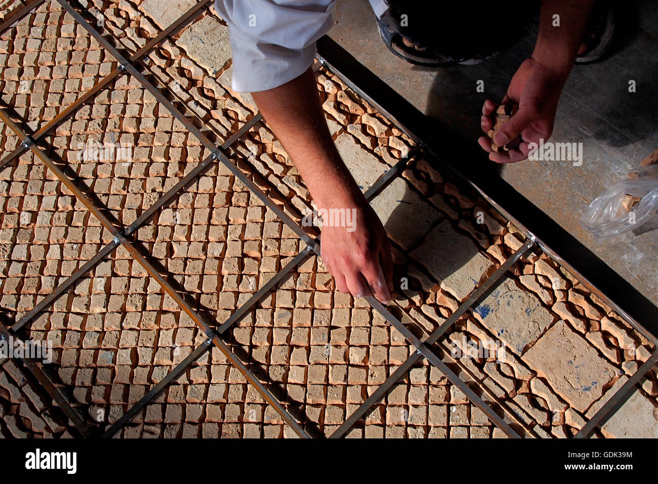 Preparation of a table with "Zellig" (hand cut ceramic tiles), Fez ...