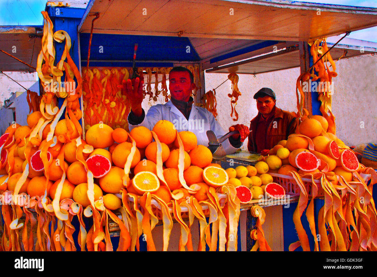 Orange juice stand on the harbour at Essaouira, Morocco Stock Photo - Alamy