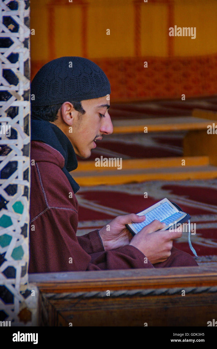 Praying in the "Madrasa Bou Inania" in the "Medina" at Fes, Morocco ...