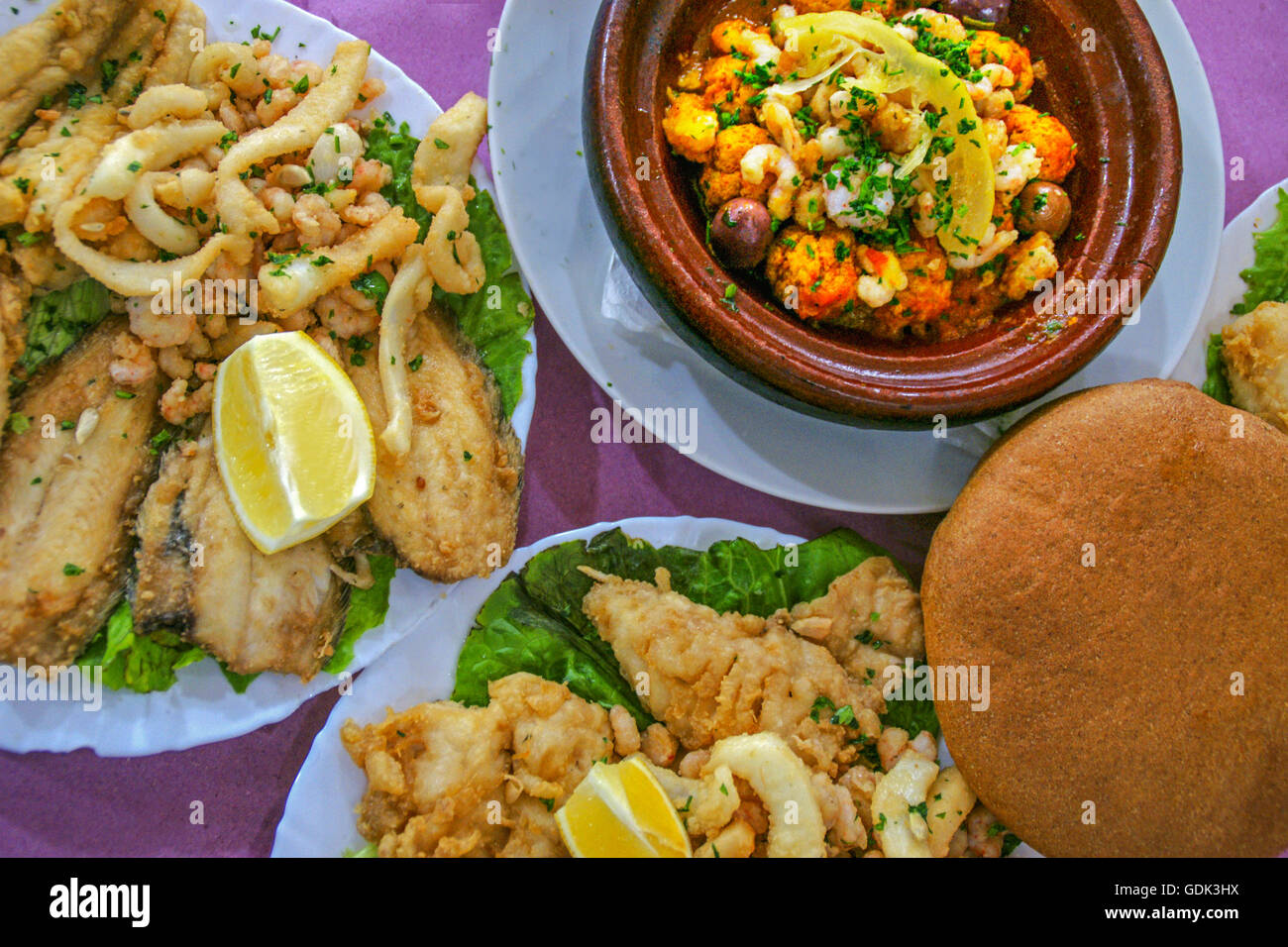 Fried fishes and fish "tagine" (stew), Fes, Morocco Stock Photo - Alamy