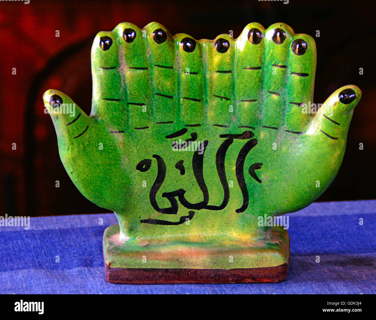 Ceramic representing praying hands, Morocco Stock Photo - Alamy