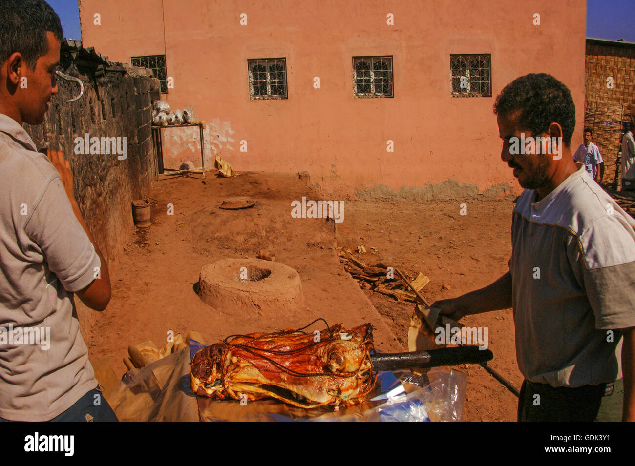 "Mechoui" (roasted lamb) out of the vertical oven, Marrakech, Morocco ...