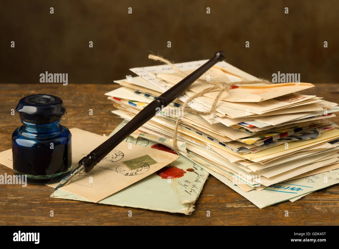 Vintage ink well and fountain pen on a table with old letters Stock ...