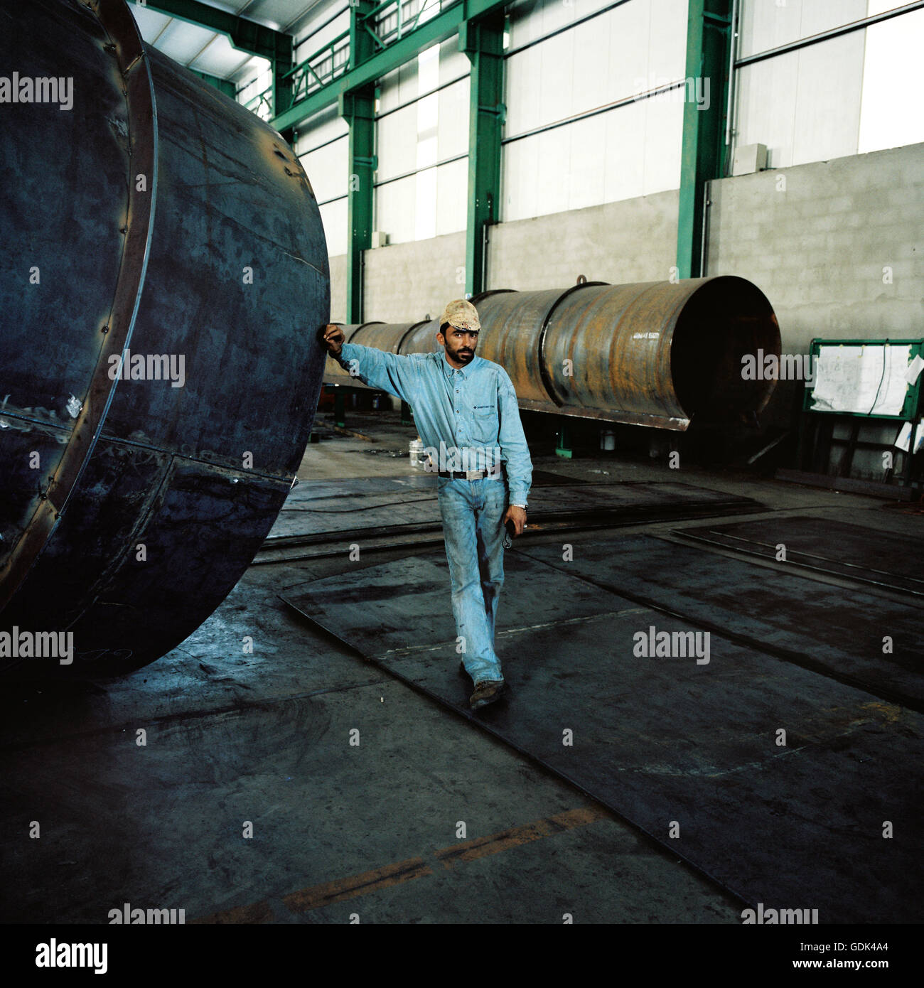 An Egyptian worker in a steel fabrication factory. Aqaba, Jordan Stock ...