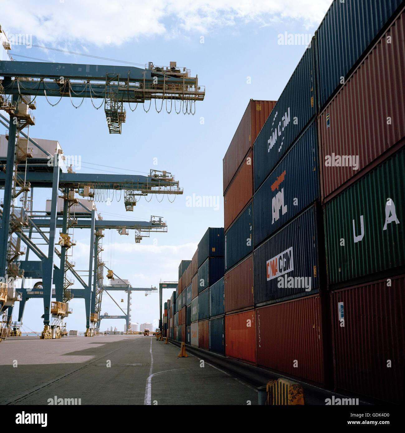 Containers wait inside the Dubai owned container port alongside the Red ...