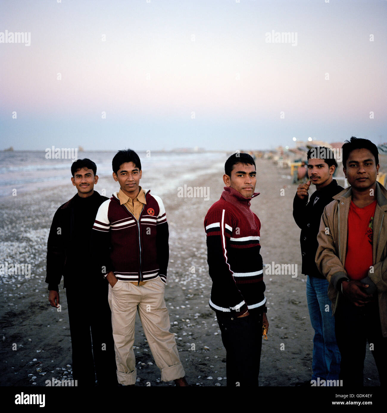 A group of Indian sailors relax during leave from their ship on the ...