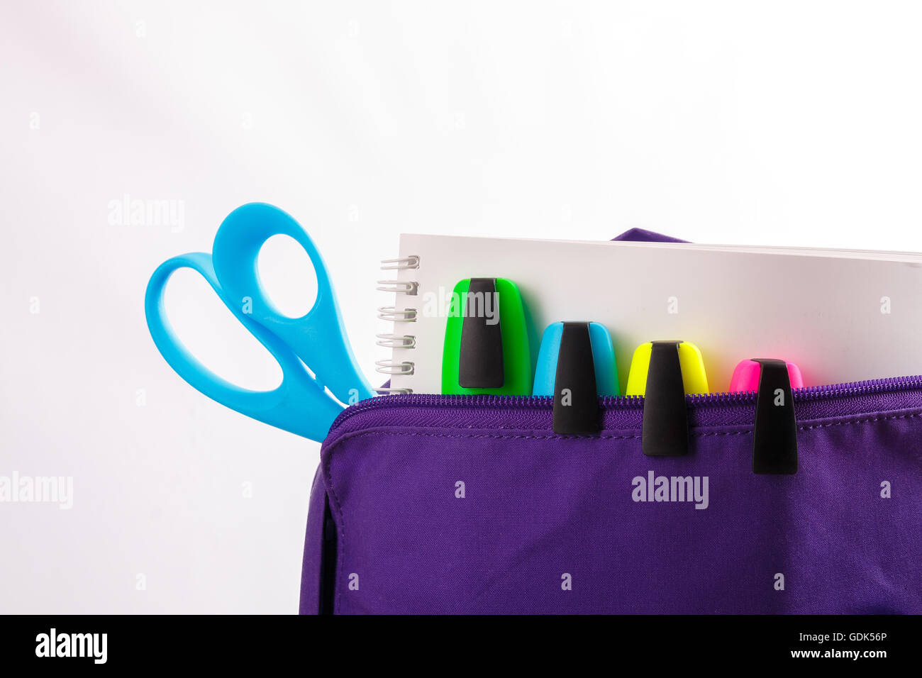 Open purple backpack with school supplies on white background. Back to ...