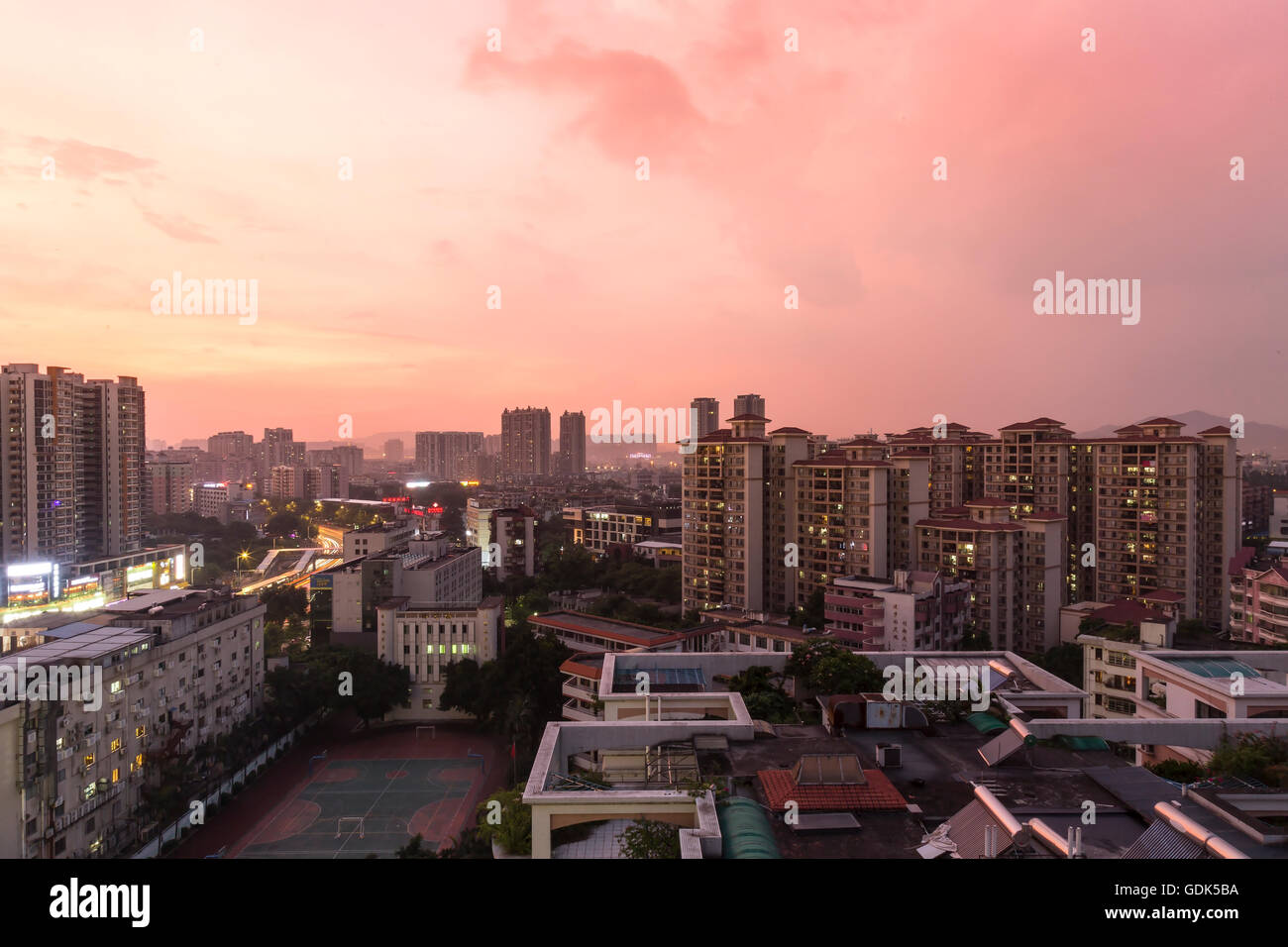 View of Guangzhou from a rooftop during sunset Stock Photo - Alamy