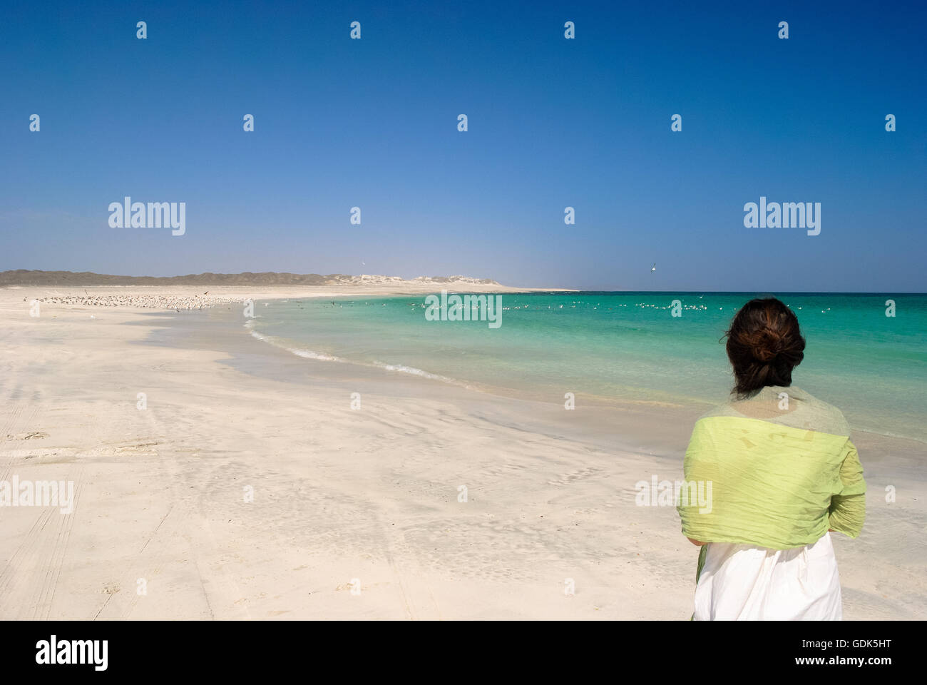 Woman on beach on Masirah Island, Oman, Middle East Stock Photo - Alamy