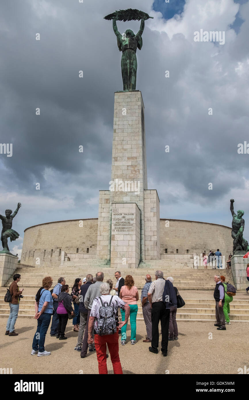 Tourist group at Liberty Statue (aka Freedom Statue), a monument on ...