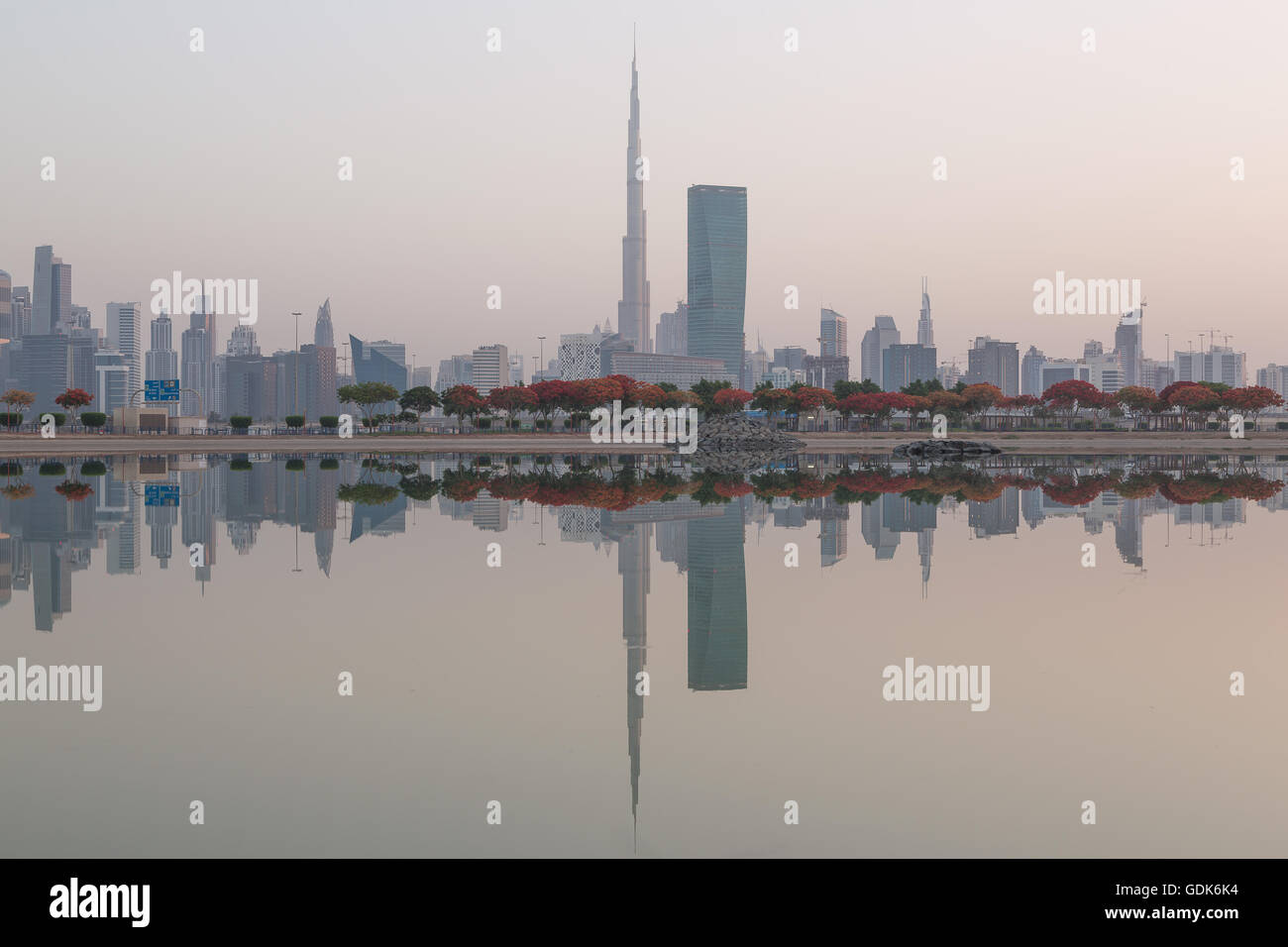 Dubai Downtown and Business Bay Skyline Sunrise reflection Stock Photo ... Dubai Downtown and Business Bay Skyline Sunrise reflection Stock Photo ...