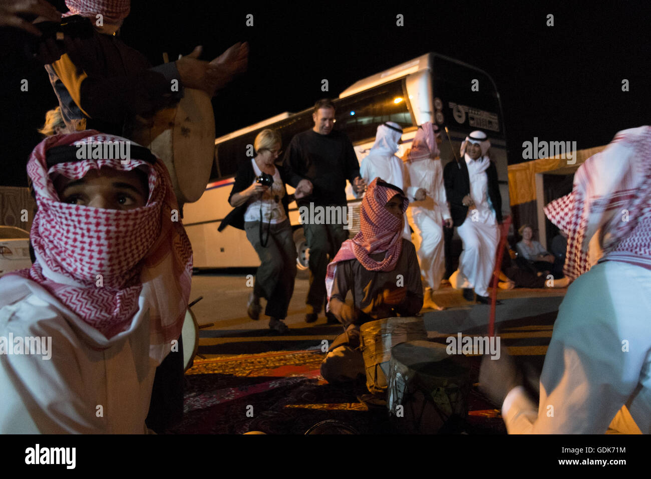 Young men perform a traditional dance for tourists at a hotel on a ...