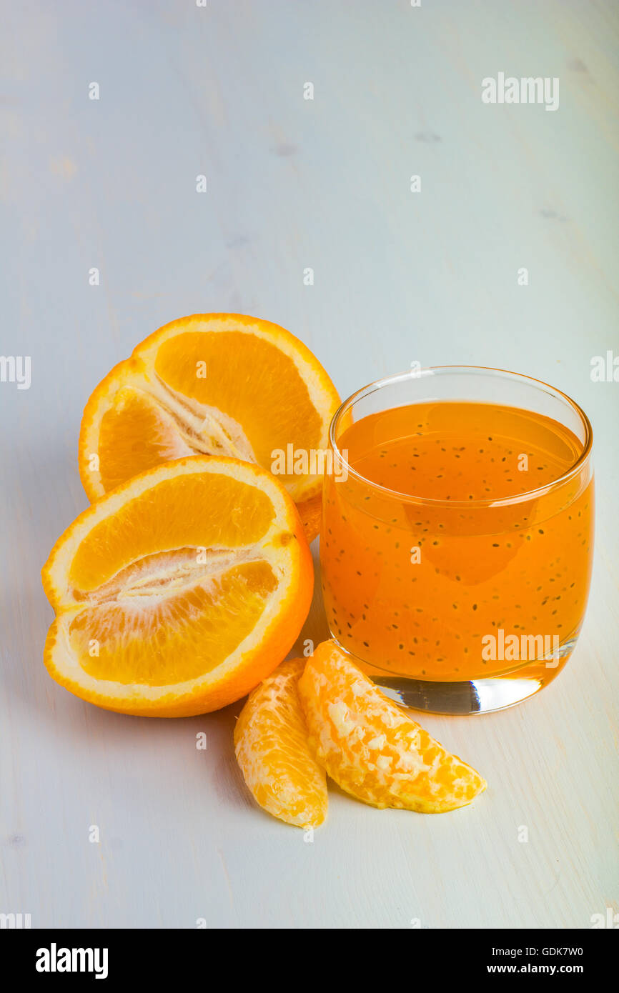 Glass of orange and basil seeds drink Stock Photo - Alamy
