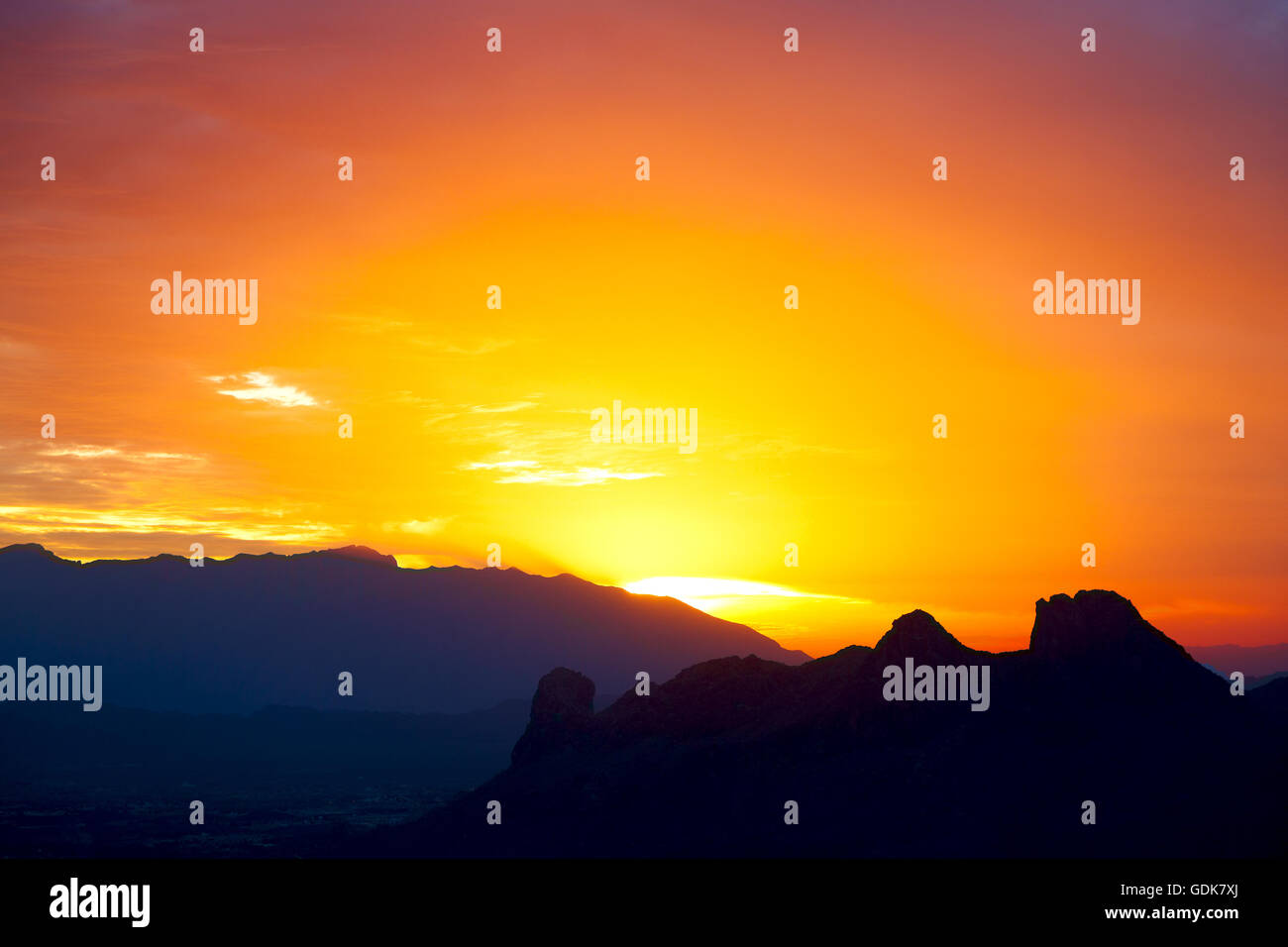 the blurred sun falling down arabian mountain in oman Stock Photo - Alamy