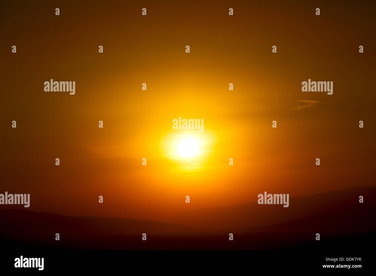 the blurred sun falling down arabian mountain in oman Stock Photo - Alamy