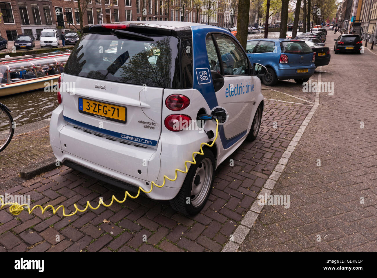 An electric car being charged in Amsterdam, Holland, Netherlands Stock ...