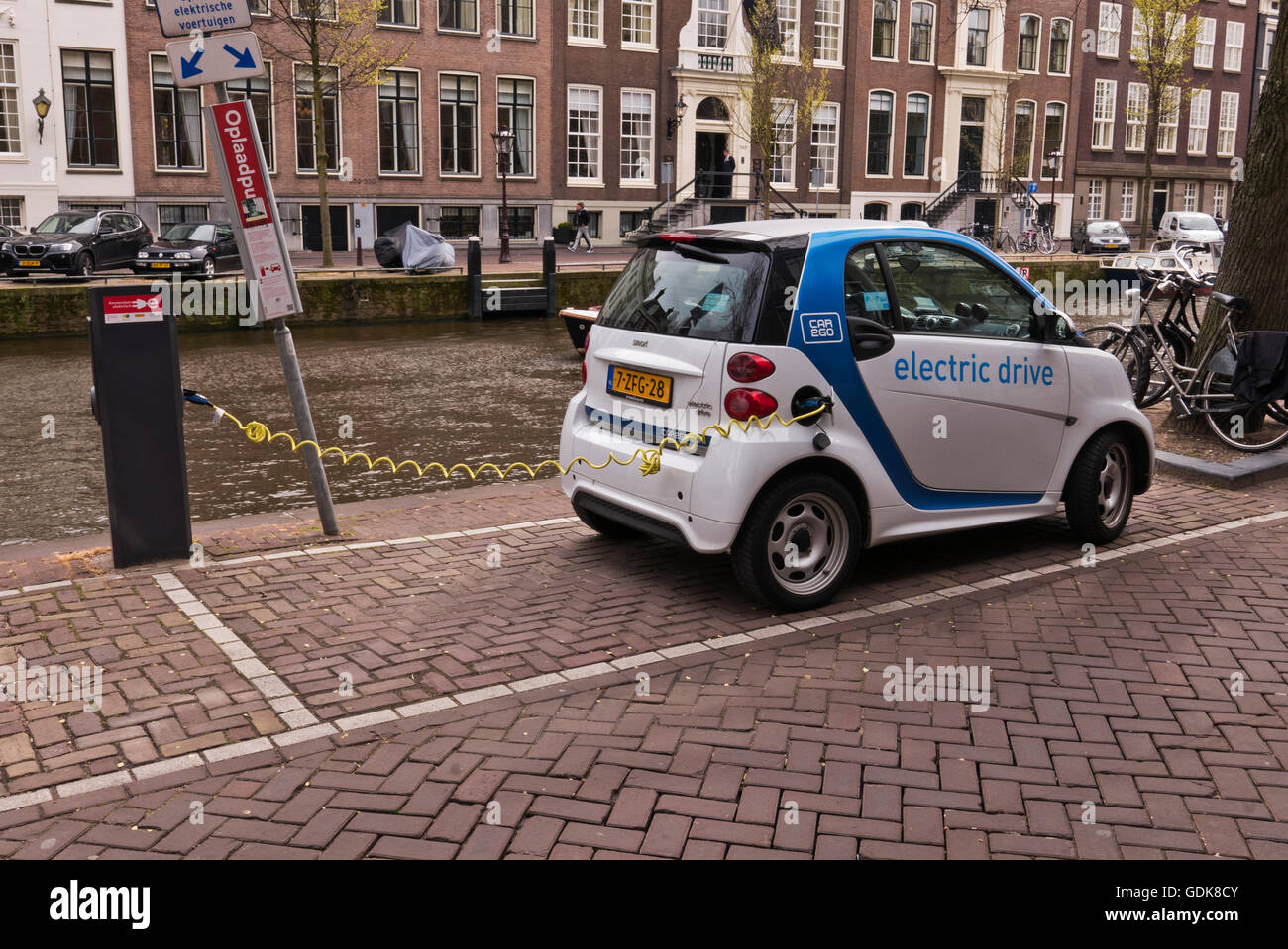 An electric car being charged in Amsterdam, Holland, Netherlands Stock ...
