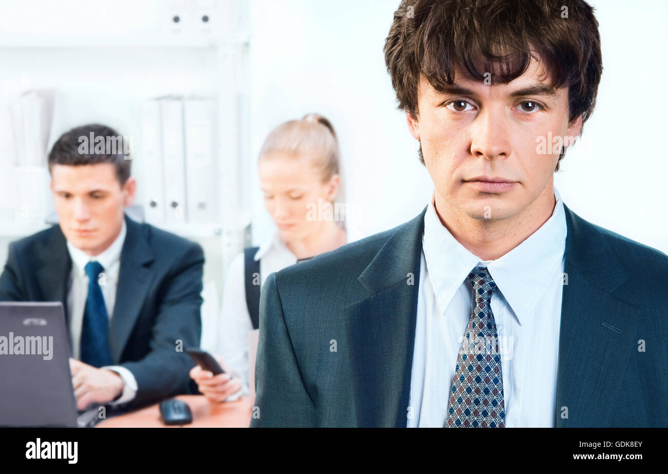 Business team and a leader Stock Photo - Alamy