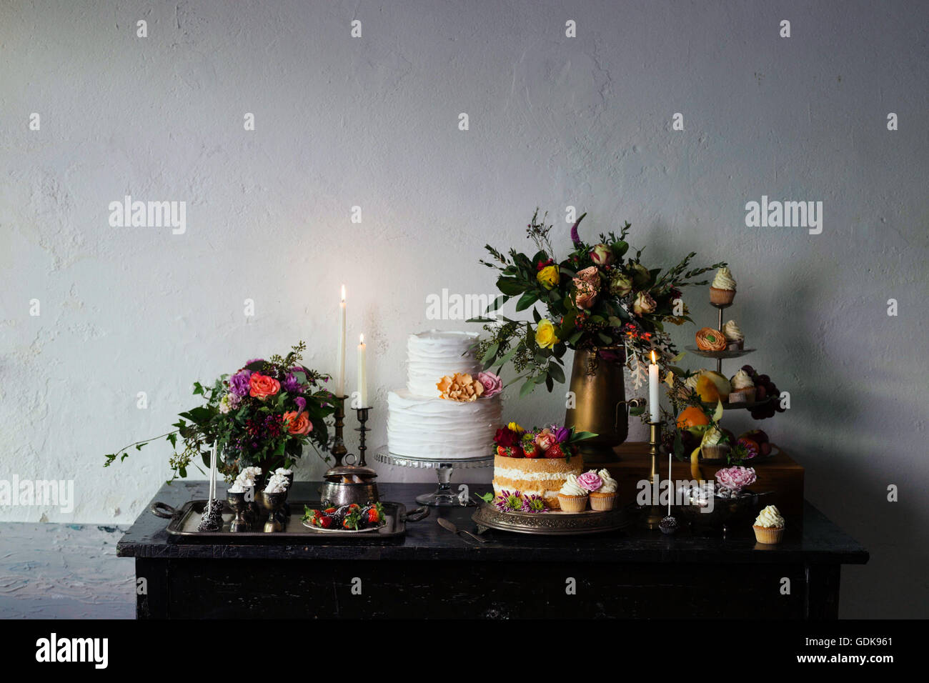 Sweet table inspired by Dutch masters still lifes. Dark shadows, window ...