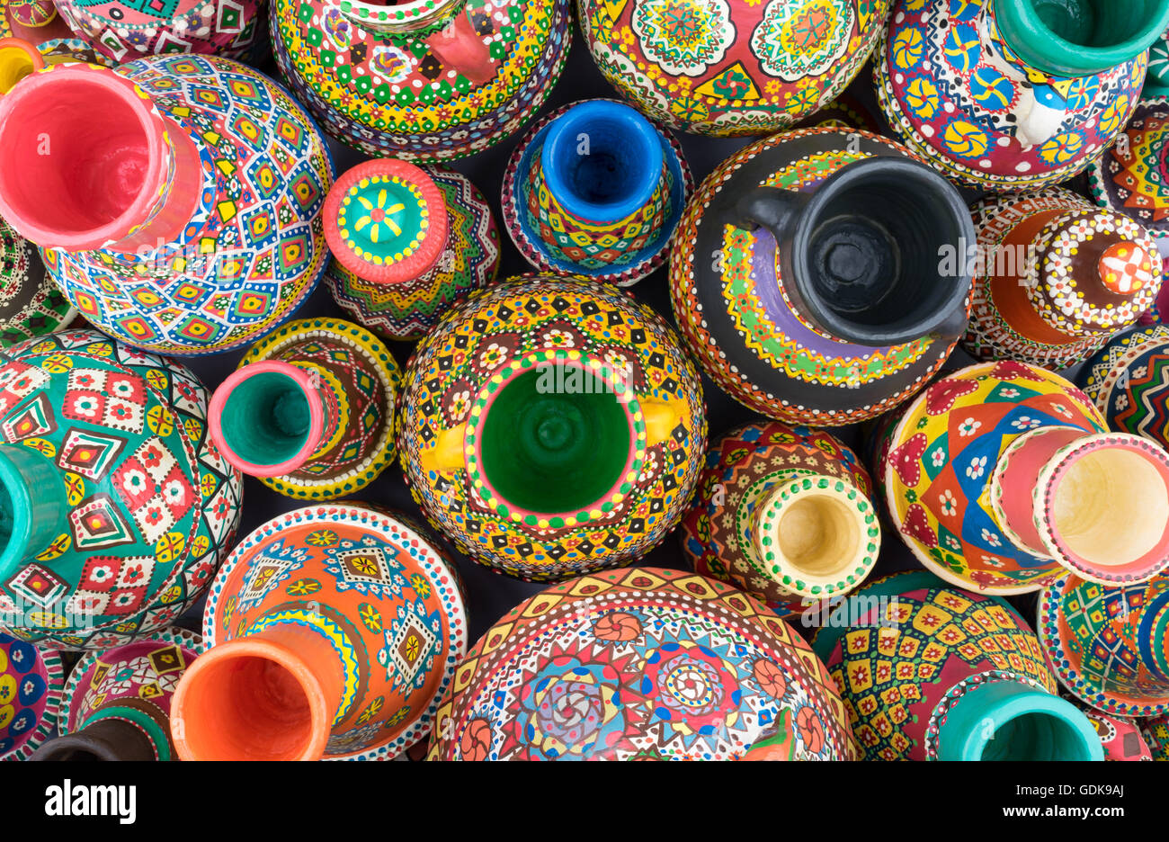 Top view showing a composition of artistic painted handcrafted pottery ...